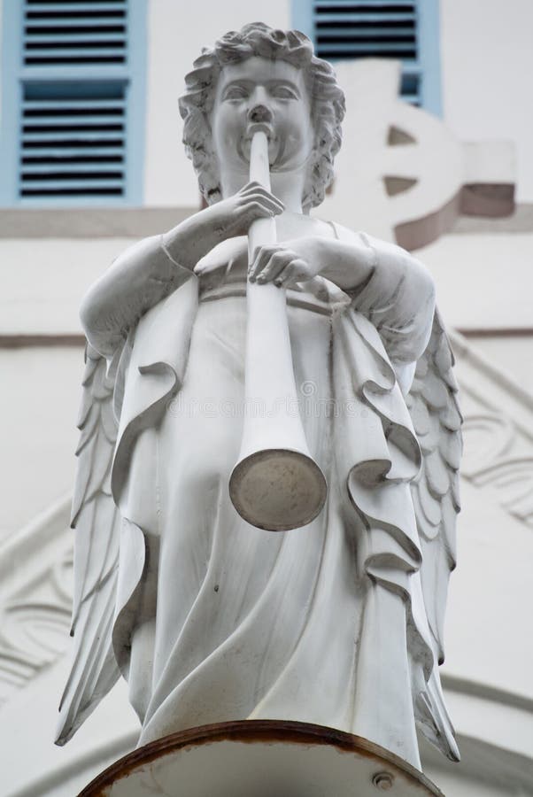 Flute Playing Angel Figurine Stock Photo - Image of protection, faith ...