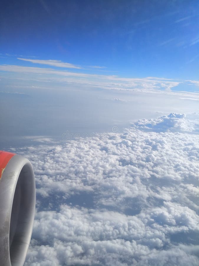 Fly above the clouds stock image. Image of reflection - 223477483