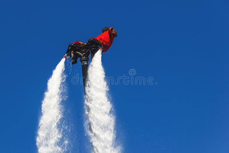 Fly Board, Man on a Flyboard in Red Editorial Photography - Image of ...