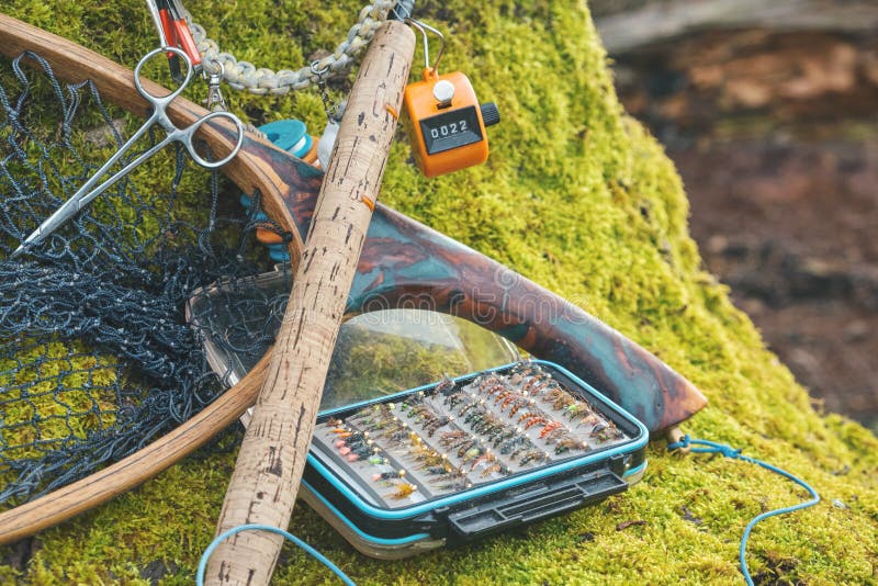 Fly Box and Fishing Tackle on the River Bank Stock Image - Image of ...
