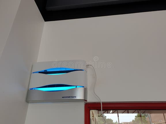 Fly Catcher Mounted on a Wall with Blue Light on Editorial Photography ...