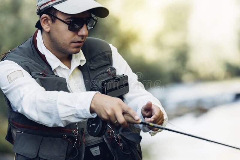 Fly Fisherman Using Flyfishing Rod. Stock Photo - Image of outdoor ...
