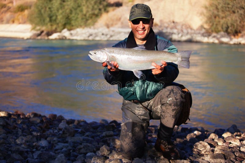 Fly-fishing stock photo. Image of catch, rocks, nature - 23596676