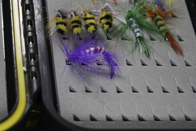 Fly for Fishing on a Background of Colored Bokeh Light Stock Image ...