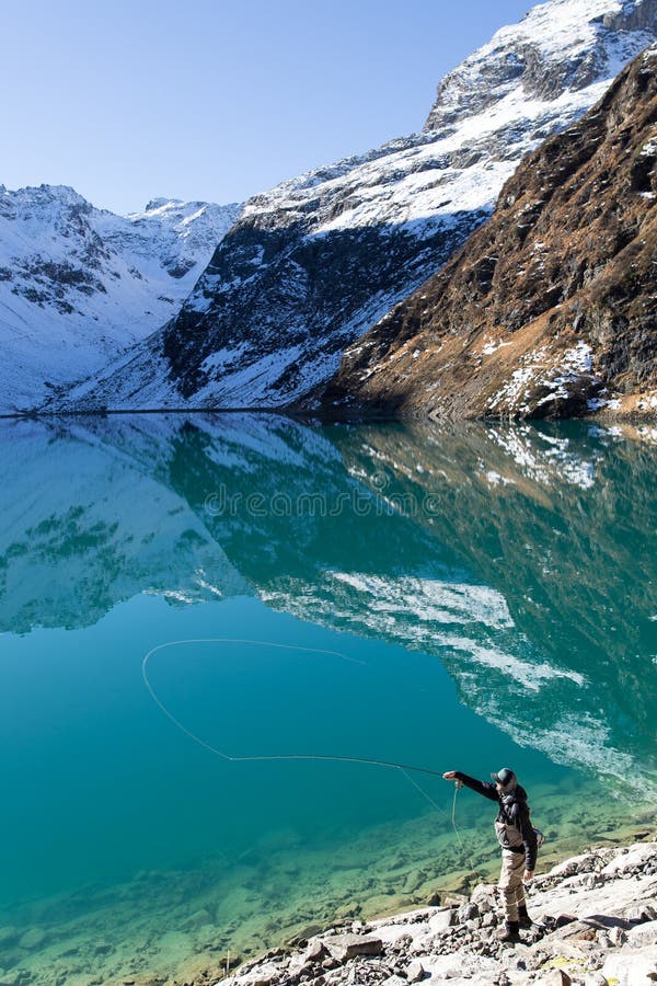 Fly Fishing at Mountain Lake Editorial Stock Photo - Image of runner ...