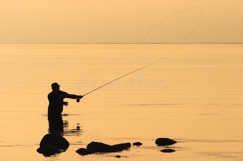 Fishing at Sunset stock image. Image of quiet, fishermen - 893075