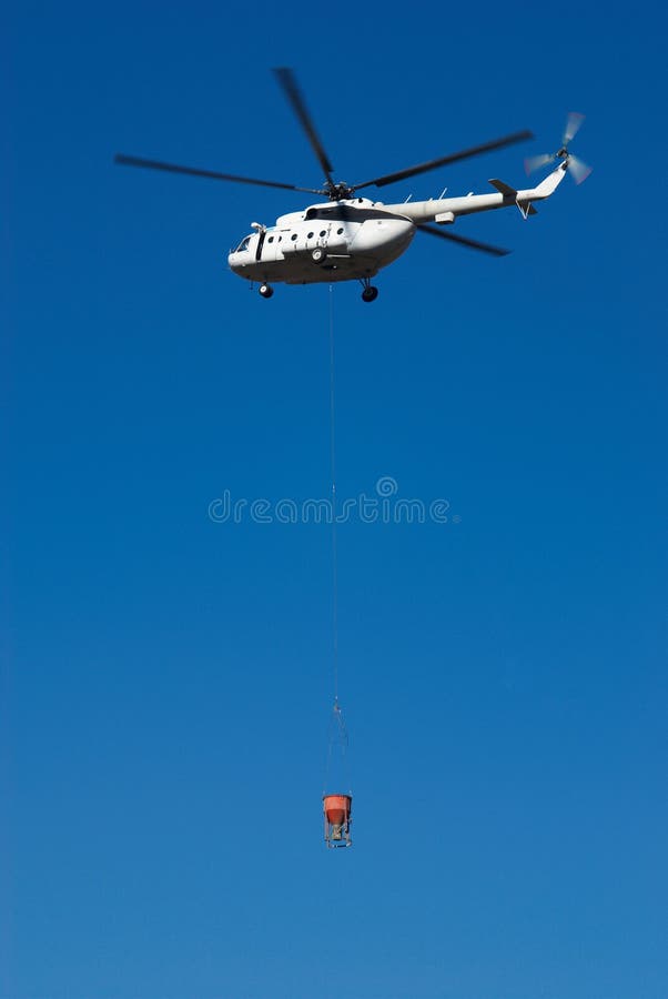 Fly helicopter with cargo stock photo. Image of hover - 3400144