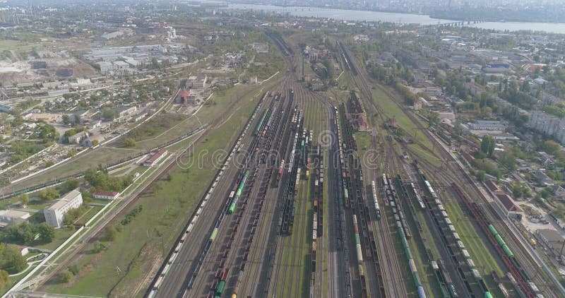 Fly Over a Large Railway Junction. Freight Trains Stand at the Railway ...