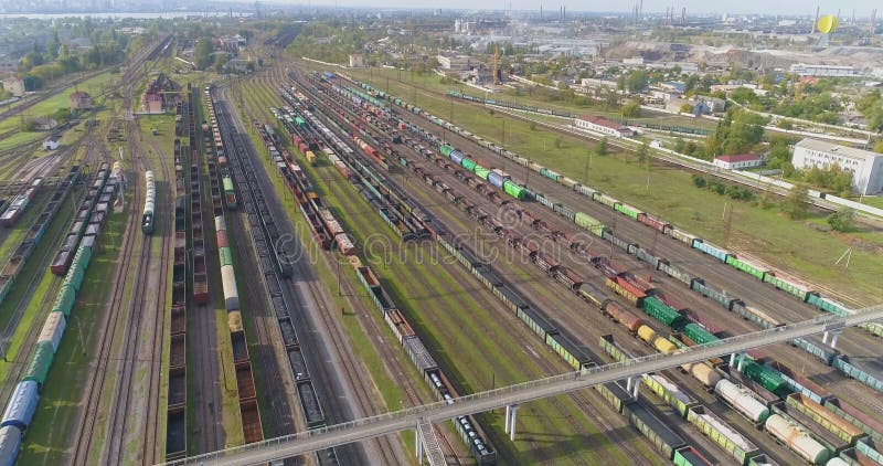 Fly Over a Large Railway Junction. Freight Trains Stand at the Railway ...