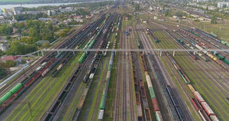 Fly Over a Large Railway Junction. Freight Trains Stand at the Railway ...