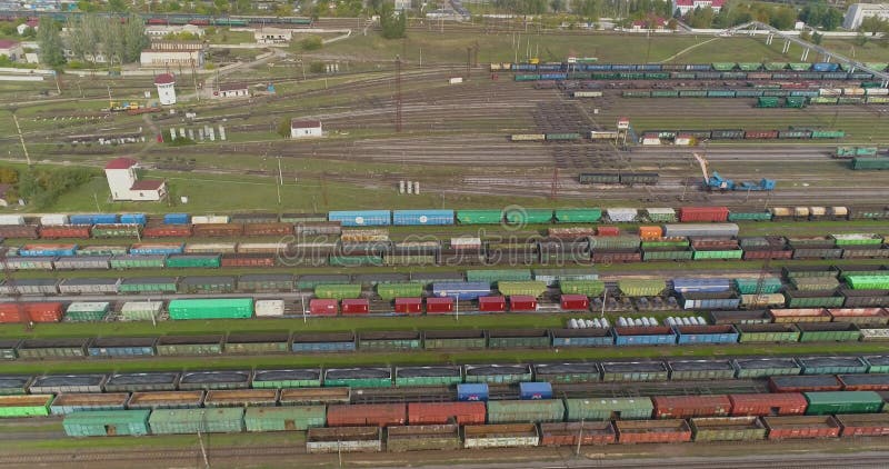 Fly Over a Large Railway Junction. Freight Trains Stand at the Railway ...