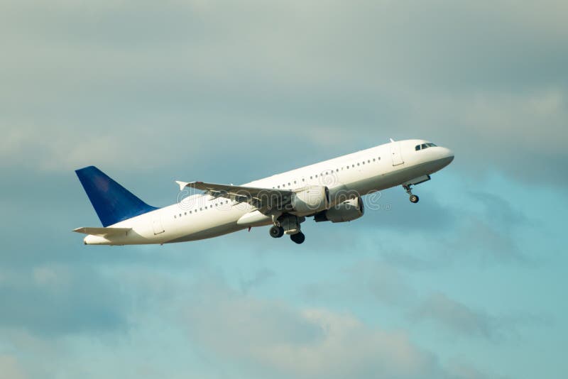 Fly plane on blue sky stock photo. Image of flight, sunlight - 270965808