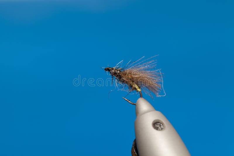 Fly tying hooks stock image. Image of flyfishing, fishing - 143374743