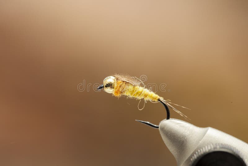 Fly tying hooks stock image. Image of hand, imitation - 144031753