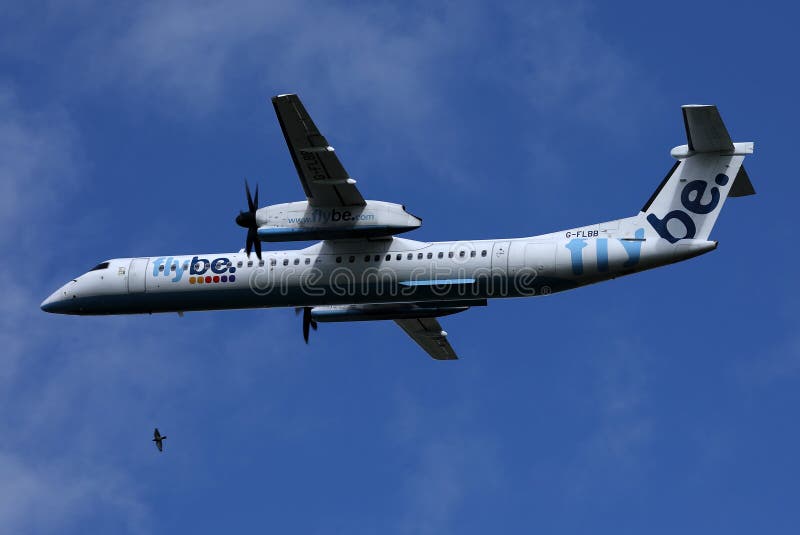 FlyBe Jet Flying Up in the Sky Editorial Photo - Image of aviation ...