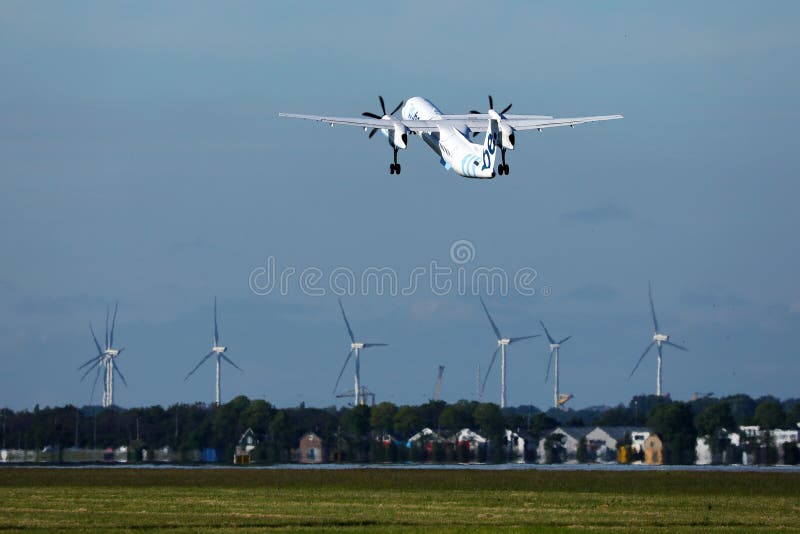 FlyBe Jet Flying Up in the Sky Editorial Photo - Image of runways ...