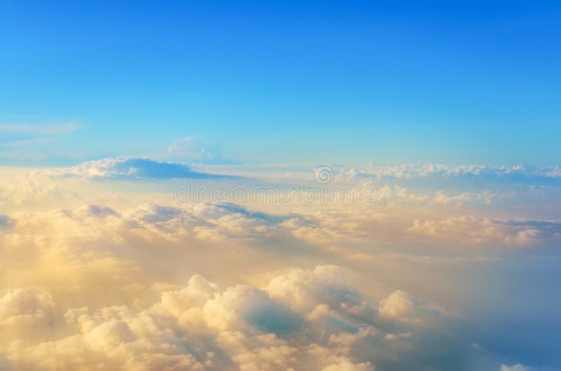 Flying Above the Clouds. View from the Airplane, Soft Focus Rays of ...
