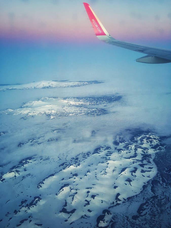 Flying above Iceland editorial stock image. Image of airplane - 144411989