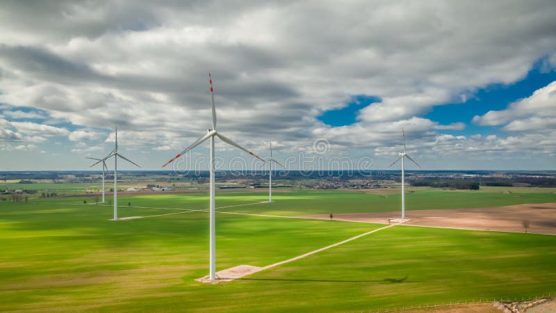 Flying Above White Wind Turbines As Pure Energy Stock Photo - Image of ...