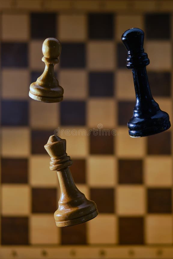 Flying in the Air Chess Pieces on the Background of the Chessboard ...