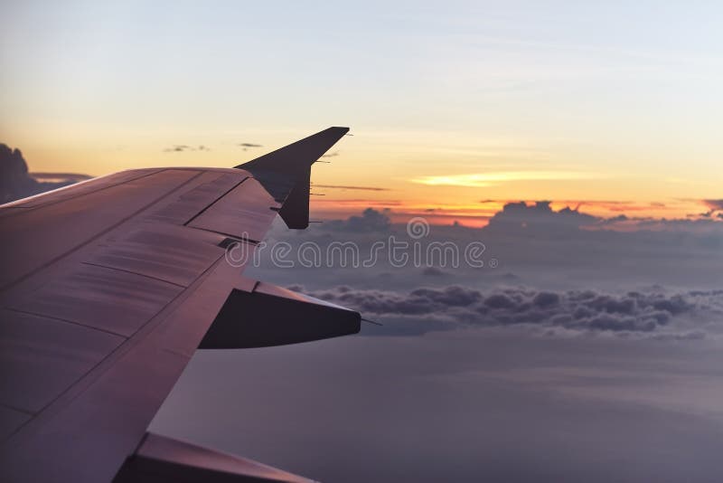 Flying Aircraft Wing on Beautiful Sunset Stock Photo - Image of ...