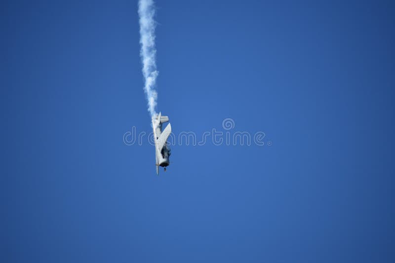 Flying airplane with smoke stock image. Image of soar - 100813765