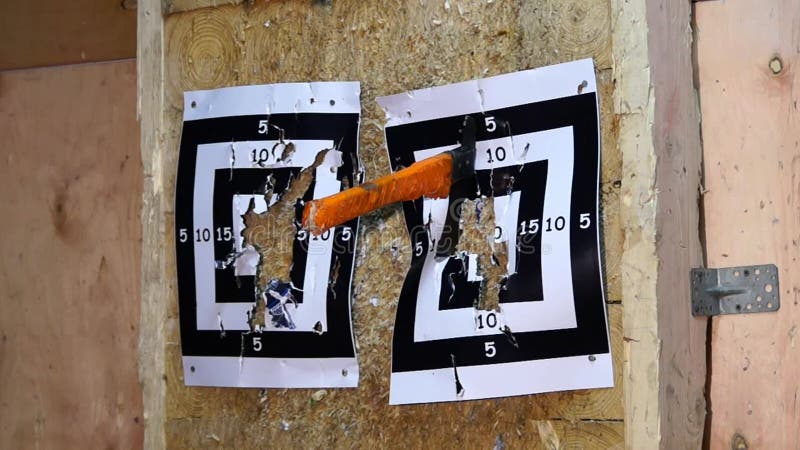 Flying Axe. Man is Throwing an Axe. Tournament. Axe Throwing Stock ...