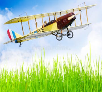Flying Biplane Over a Airfield. Stock Photo - Image of green, enjoy ...