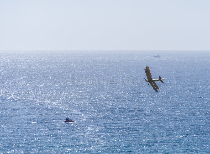 Flying biplane stock image. Image of high, mist, ocean - 263010267