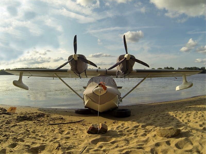 Flying boat stock photo. Image of sand, sunlight, aviation - 60310650