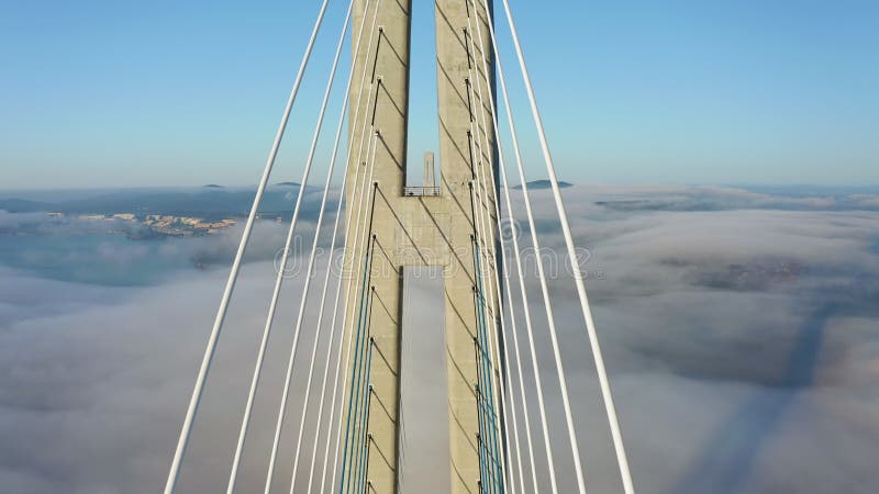 Flying between the Cables of the Bridge Built Over the Sea Strait Stock ...