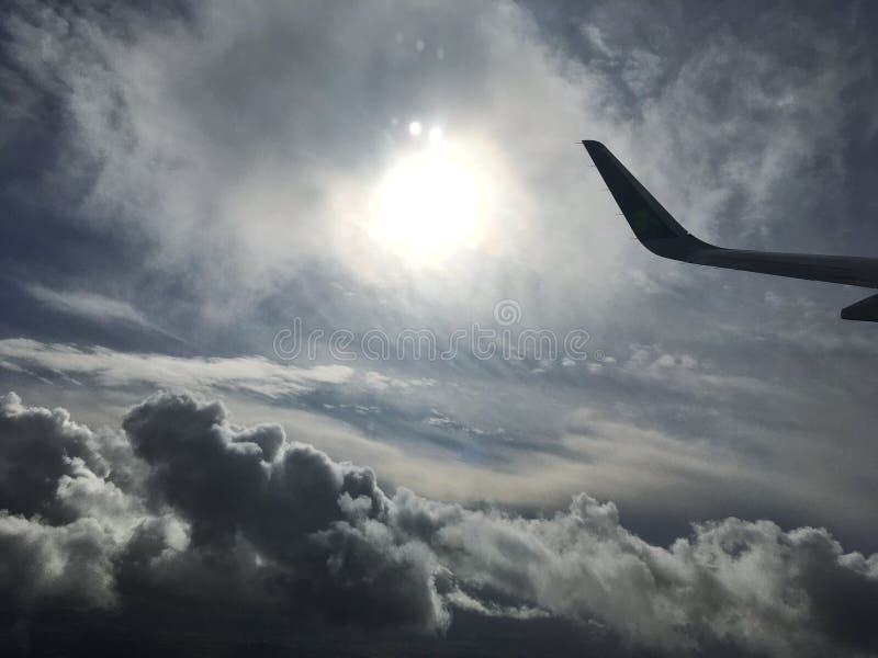 Flying in cloud formation stock photo. Image of high - 238673208
