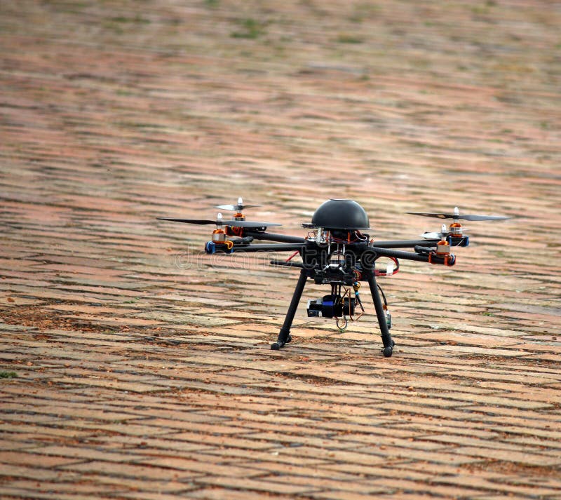Flying drone with camera stock photo. Image of octocopter - 40071798
