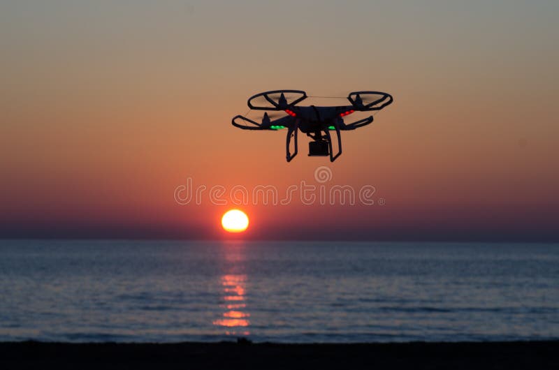 Flying Drone with Camera on the Sky at Sunset Stock Image - Image of ...