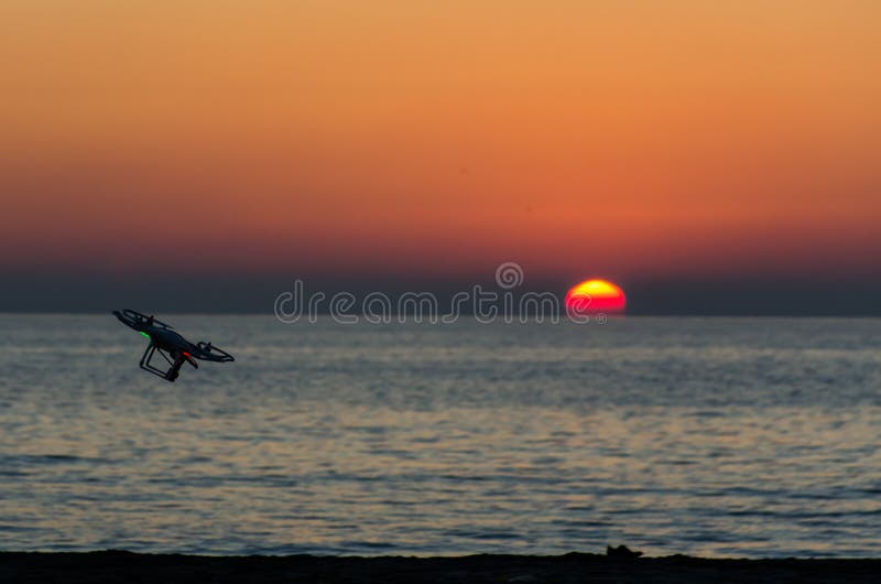 Flying Drone with Camera on the Sky at Sunset Stock Image - Image of ...