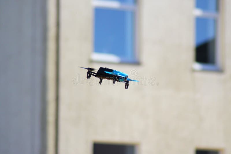 Blue Drone Flying in the City Stock Image - Image of outdoor, aerial ...