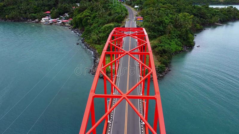 Flying a Drone Over a Road Bridge Over the Sea. Aerial View of the ...
