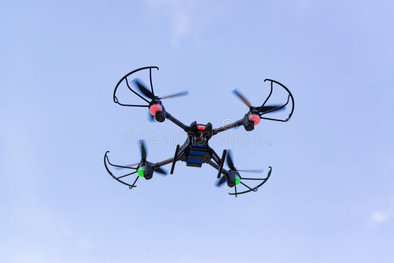 Flying Drone of Quad Copter in Blue Sky Stock Image - Image of receiver ...