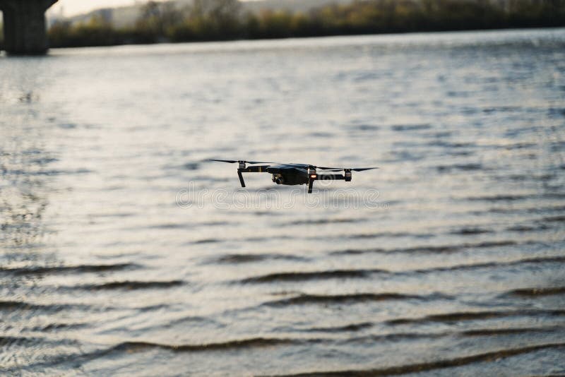 Flying Drone at Sunset Over the River Stock Image - Image of ...
