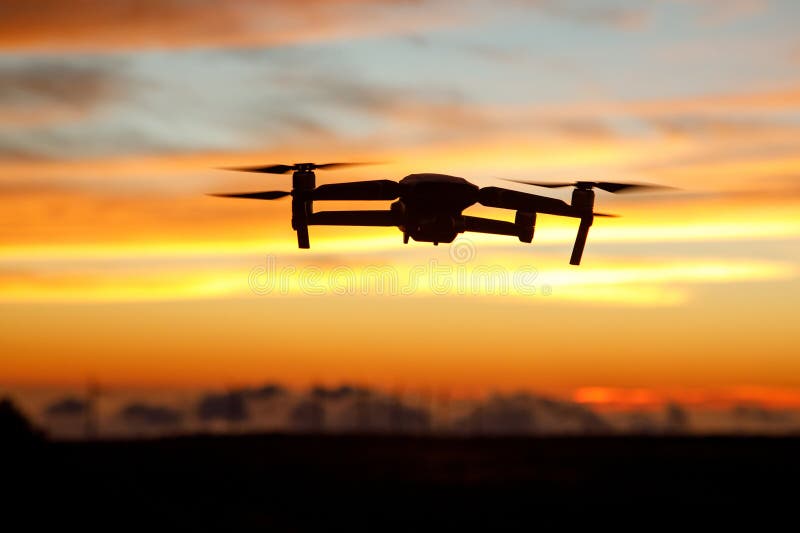 Flying Drone in a Sunset Sky. Stock Image - Image of competition ...