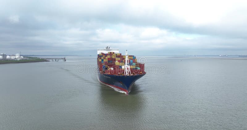 Flying in Front of a Large Container Ships. Sea Birds Flying in Front ...