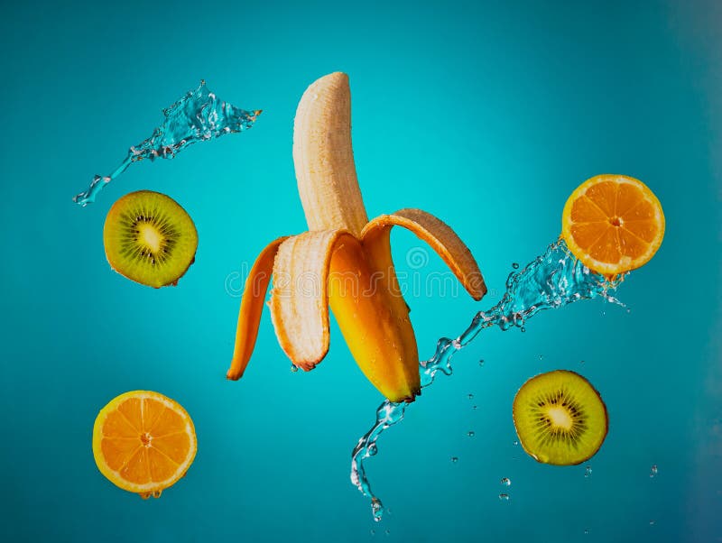 Flying Fruit on a Blue Background. Stock Image - Image of motion ...