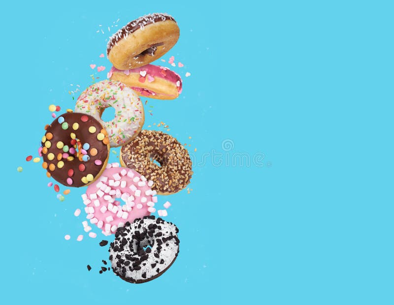 Flying Glazed Round Doughnuts. Mix of Multicolored Sweet Donuts Stock ...