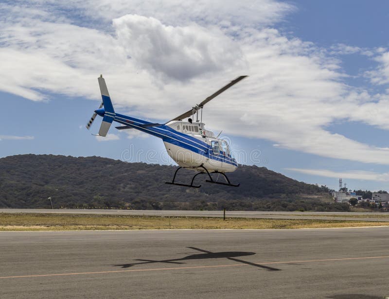 Flying helicopter stock image. Image of aviation, mexico - 79093967