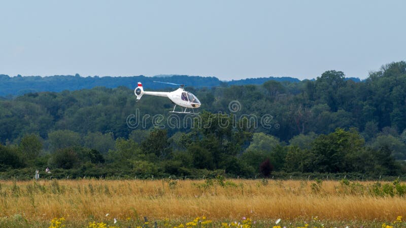 Flying Helicopter Over the Fields Stock Image - Image of grassland ...
