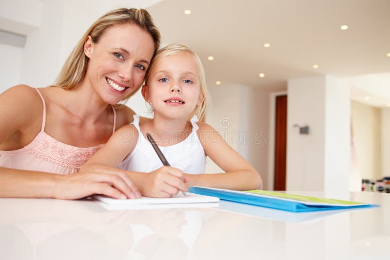 Flying through Her Homework. a Loving Mother Helping Her Daughter with ...