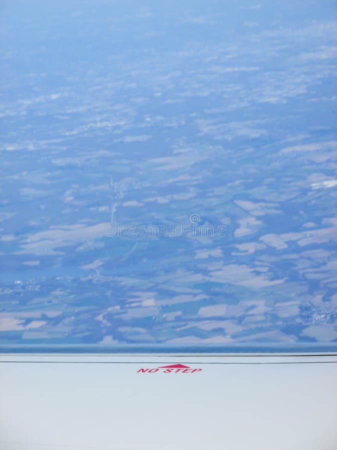 Flying High with No Step on Wing of Plane Stock Photo - Image of arrow ...