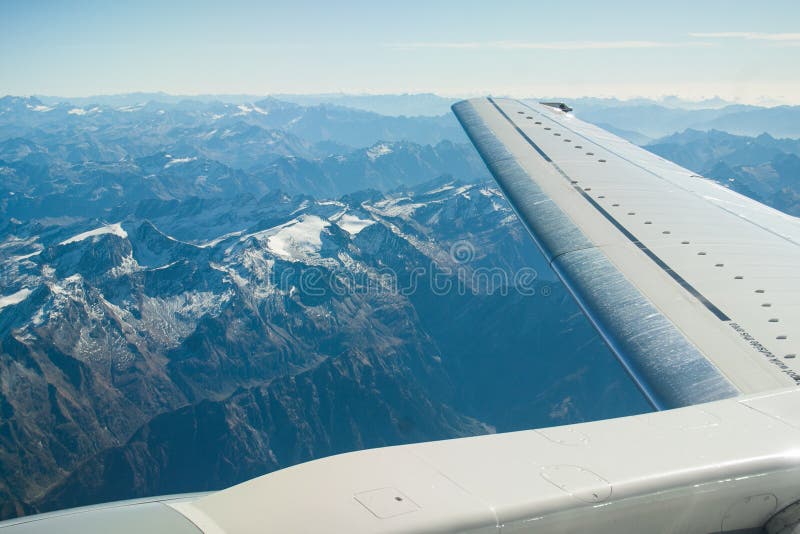 Flying high over the Alps stock image. Image of rugged - 36887505