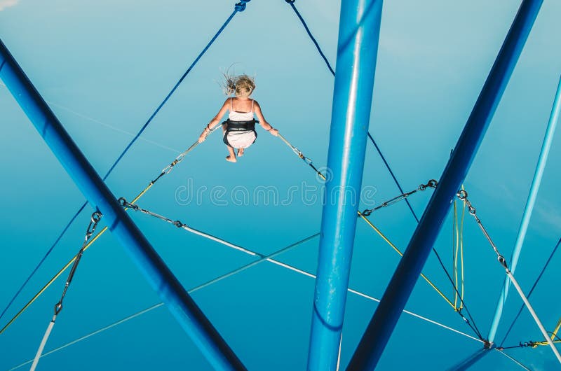 Flying High Up Side Down in Bungee Jumping Attraction Stock Photo ...