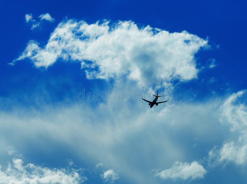 Flying Jet in Blue Skies Travel Background Stock Image - Image of ...